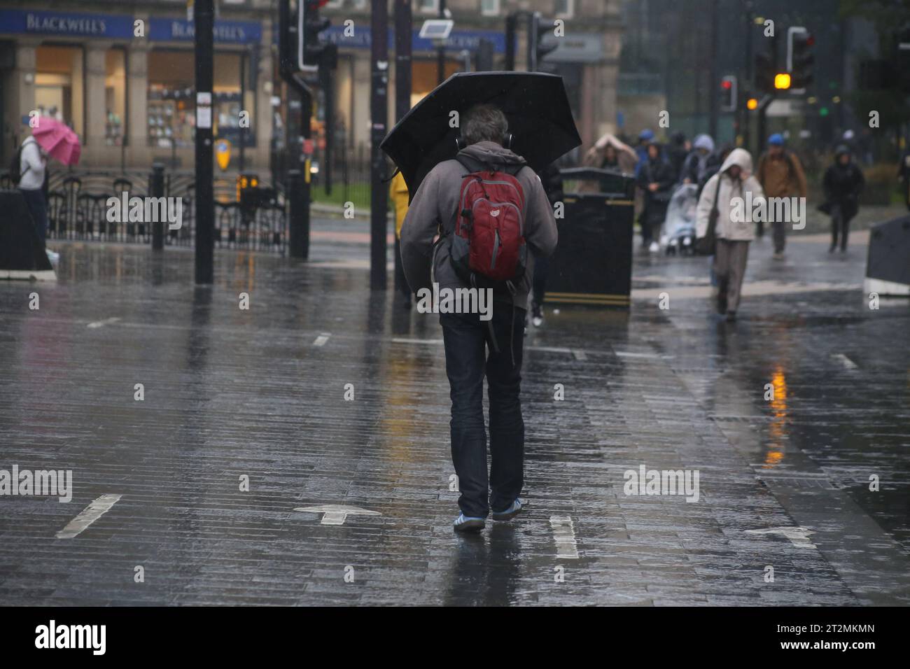 Newcastle, UK. 20th Oct 2023. Storm Babet - People battle the weather ...
