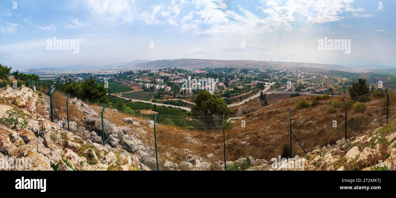 View of the town of Metula, and nearby landscape, Northern Israel, at ...