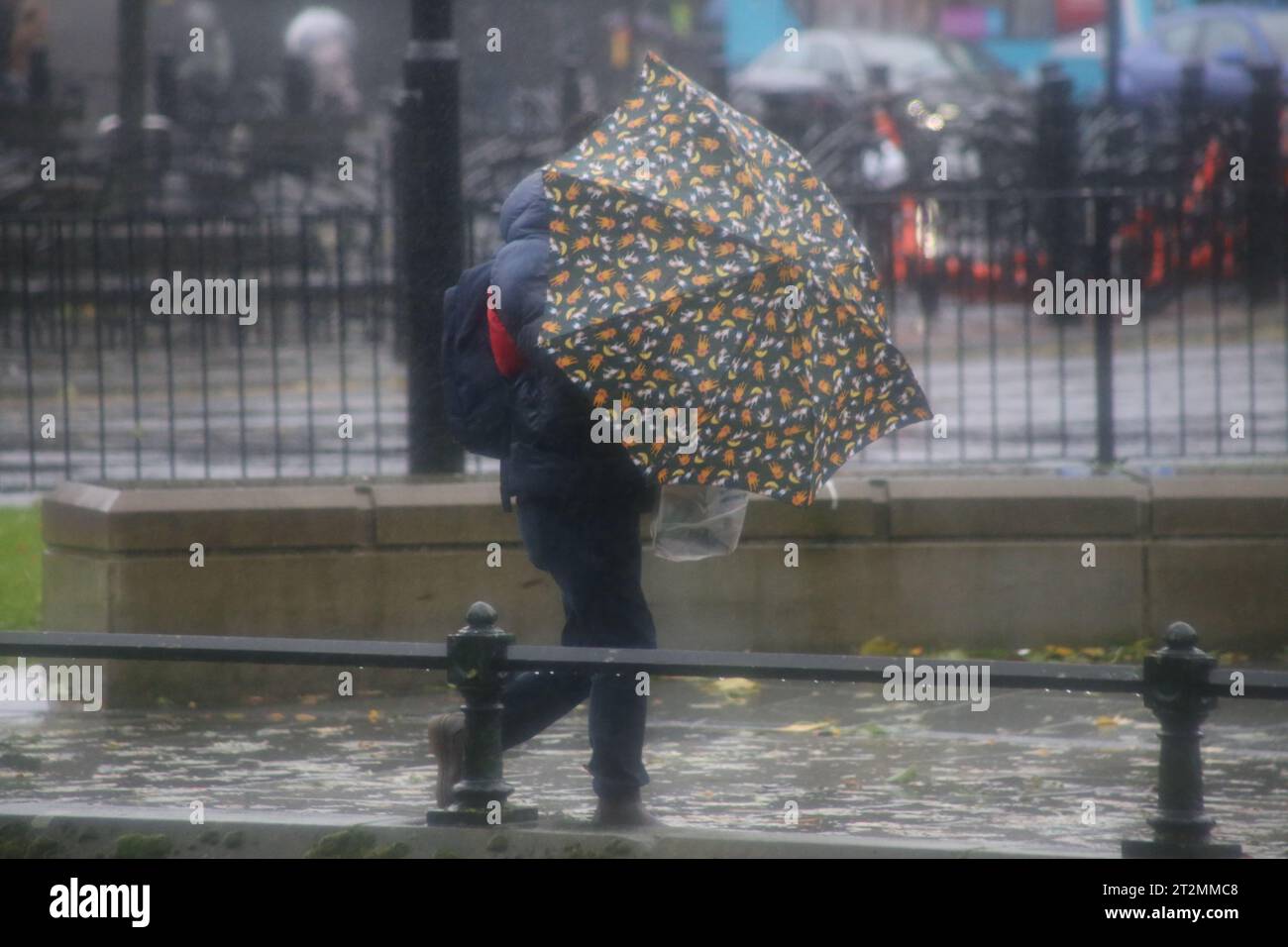 Newcastle, UK. 20th Oct 2023. Storm Babet - People battle the weather ...