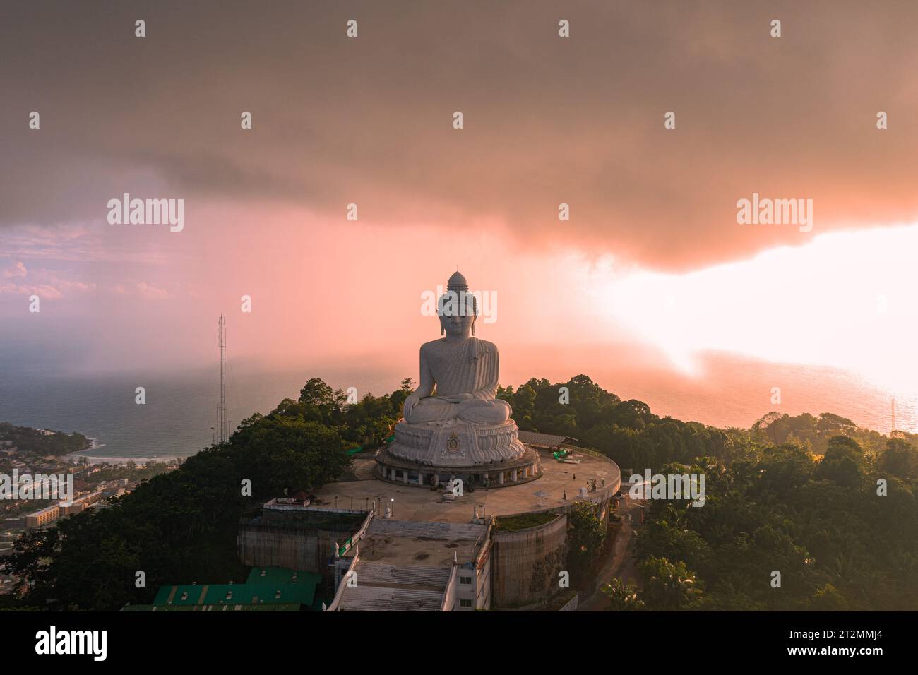 aerial view scenery sunset with rain clouds moving above beautiful ...