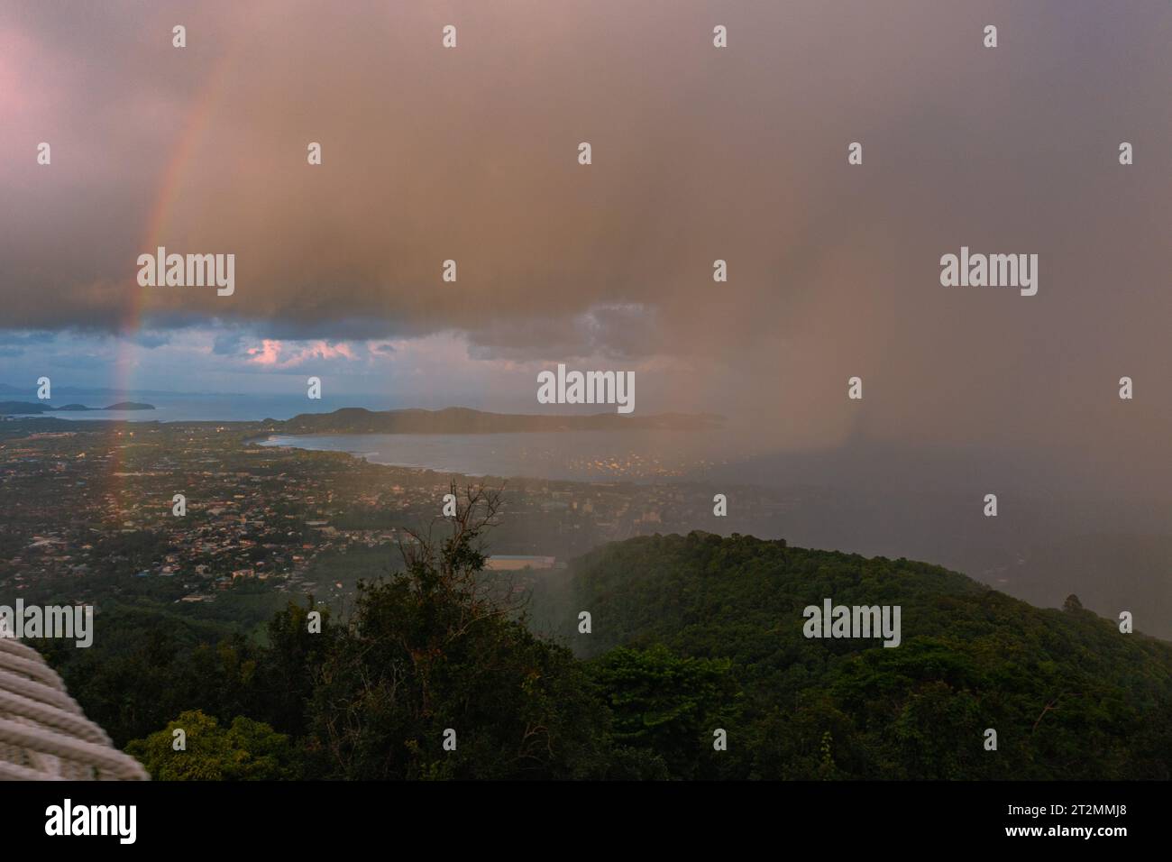 aerial view scenery sunset with rain clouds moving above beautiful ...