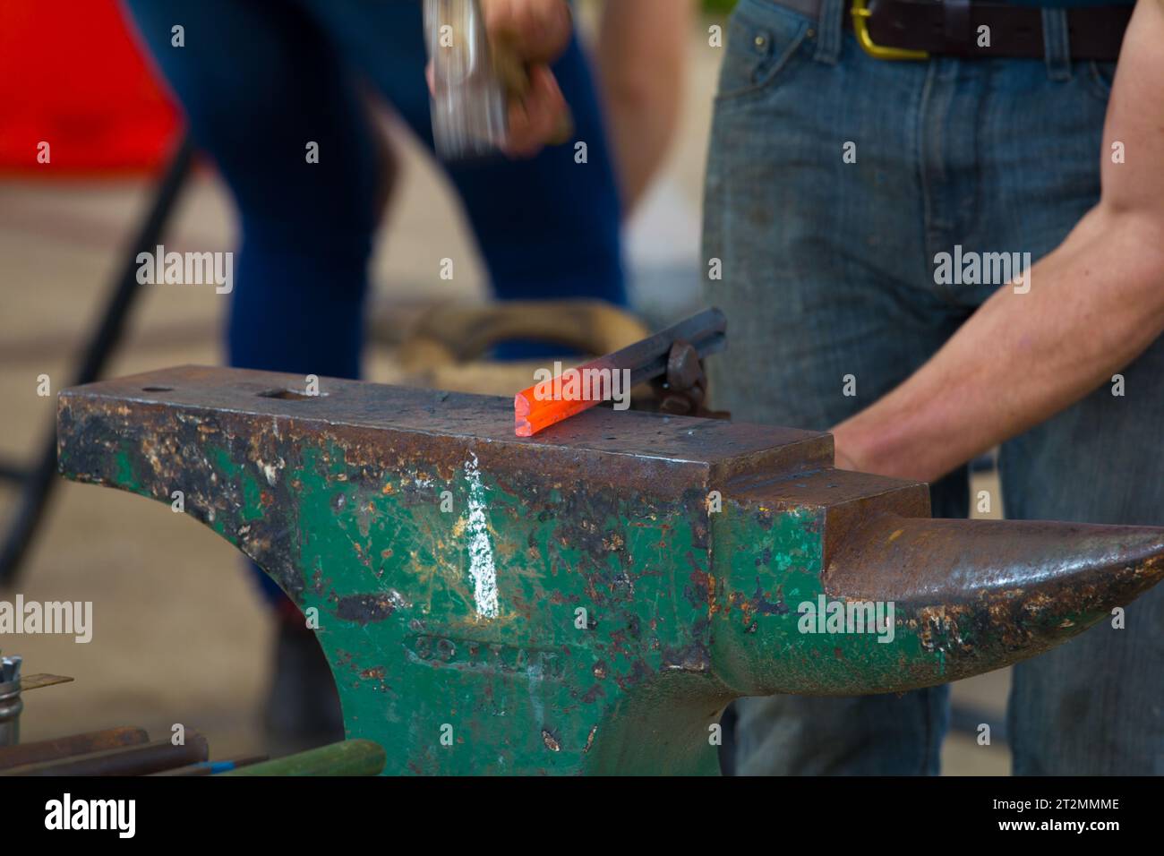 Farrier beating out an iron or steel horseshoe. Patron saint of ...