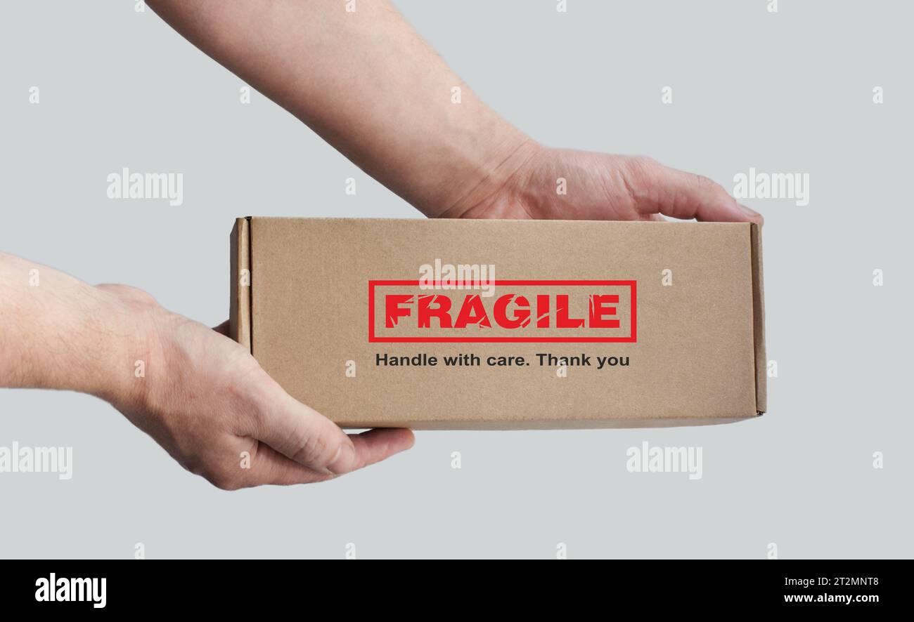 A rectangular cardboard box. Monochrome light background. An adhesive ...