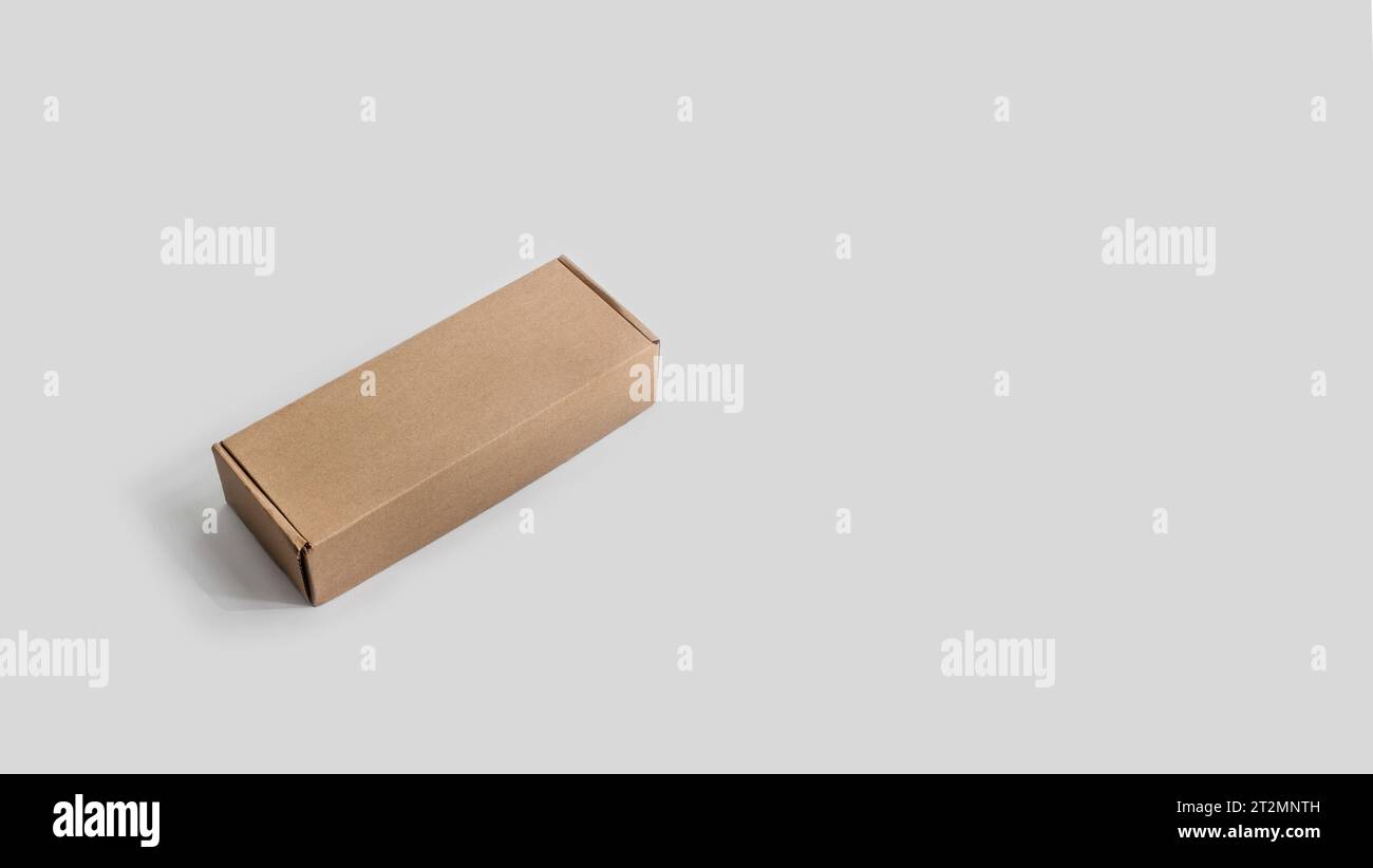 Rectangular cardboard parcel box on a light background. No people, no ...