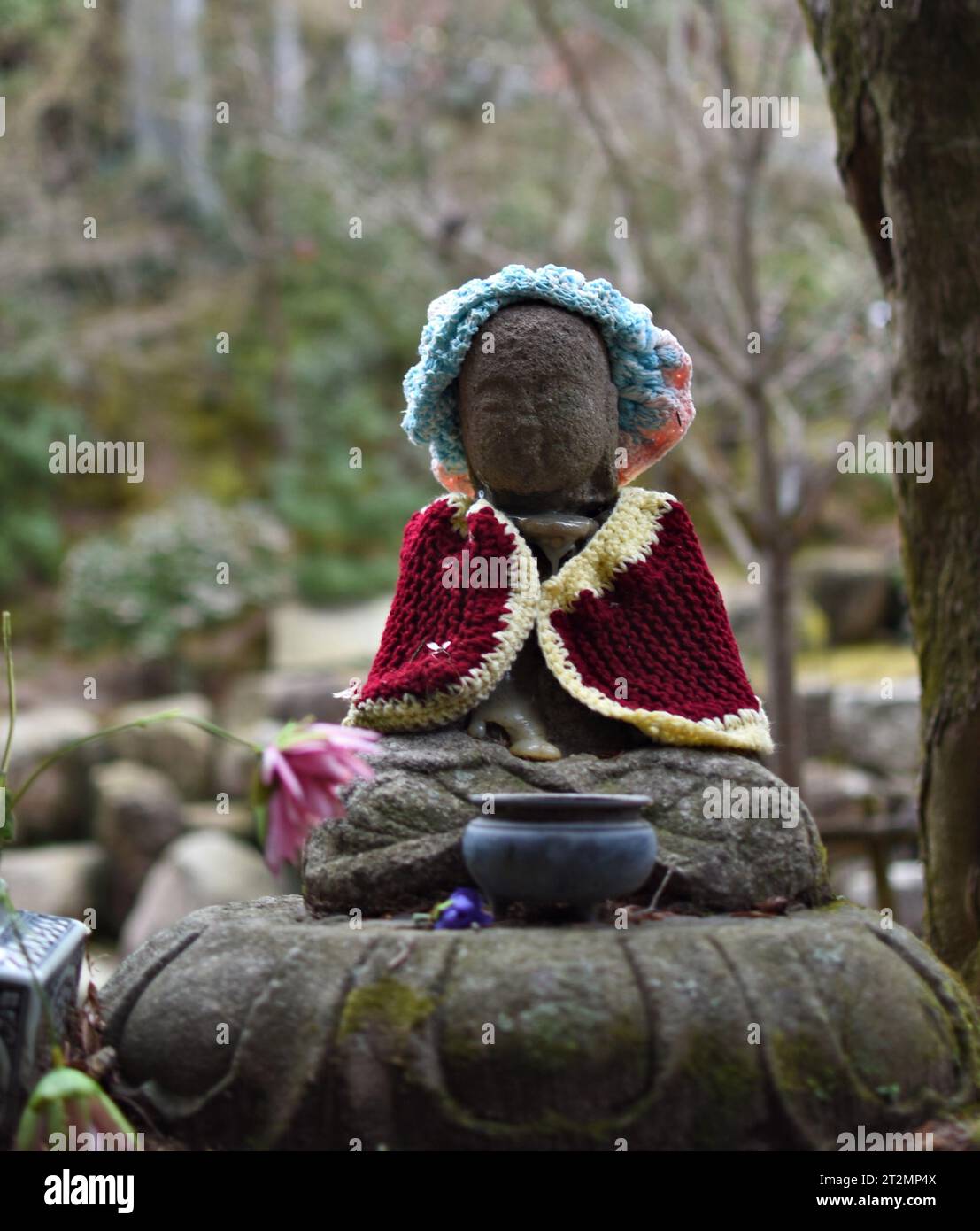 Small Rakan statues of Buddhist monks Stock Photo - Alamy