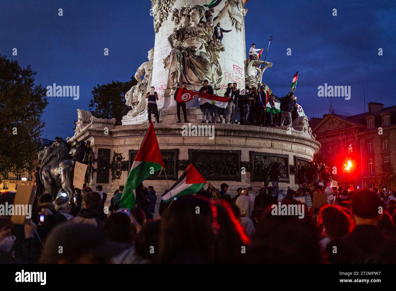 Protesters seen with a Palestinian flags at the Statue de la Republique ...
