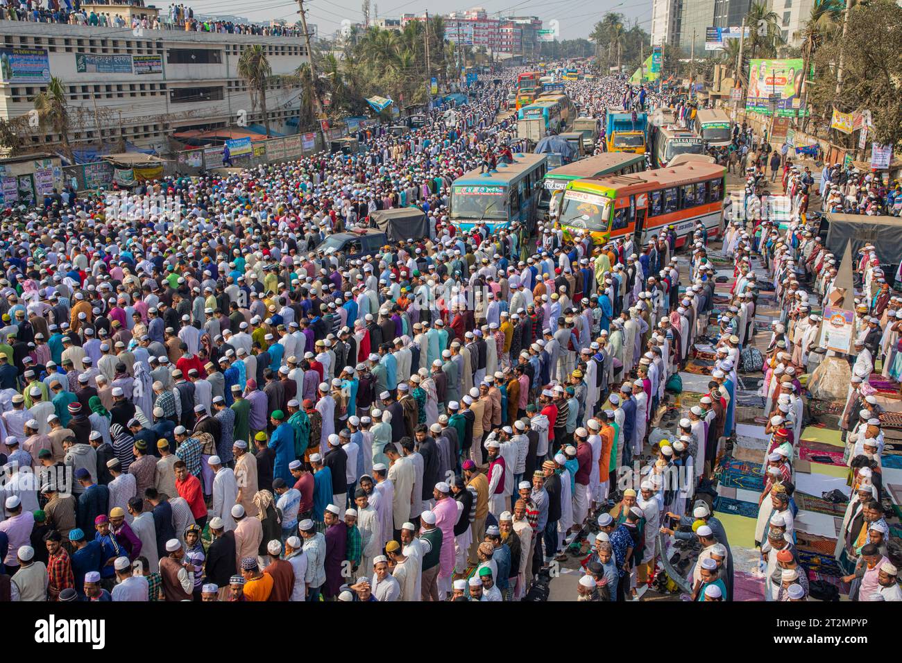 Devotees offer Jumma prayers on the Dhaka-Mymensingh highway at the ...