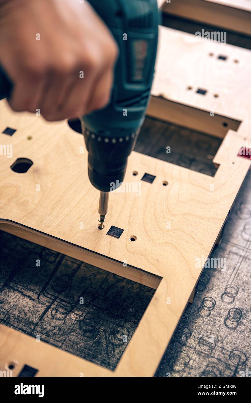 Working tools man using drill hi-res stock photography and images - Alamy