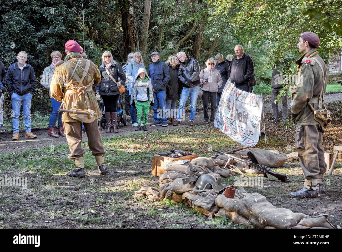 Army demonstration by a British soldier to gathered audience. 1940s WW2 ...