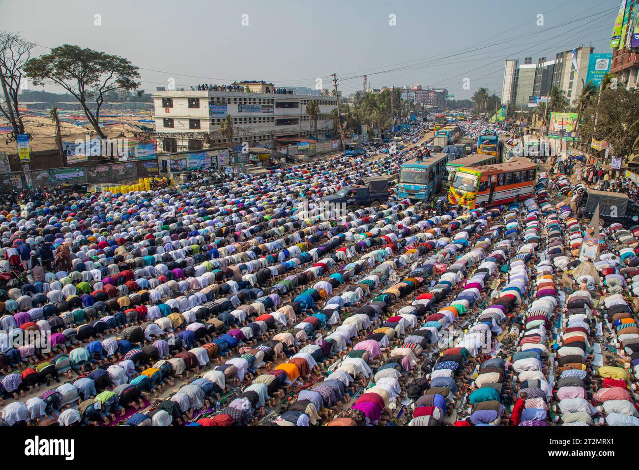Devotees offer Jumma prayers on the Dhaka-Mymensingh highway at the ...