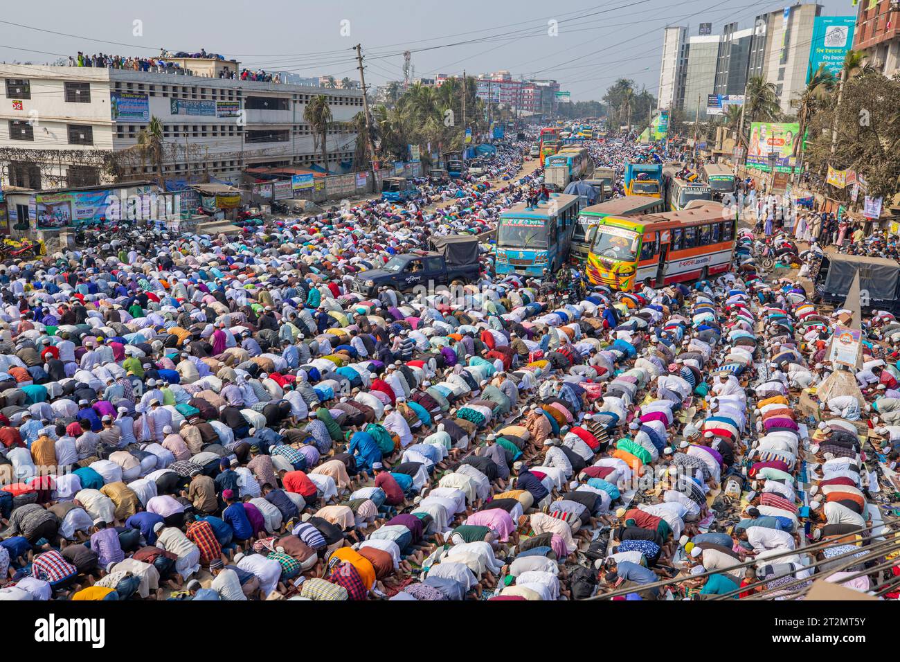 Devotees offer Jumma prayers on the Dhaka-Mymensingh highway at the ...