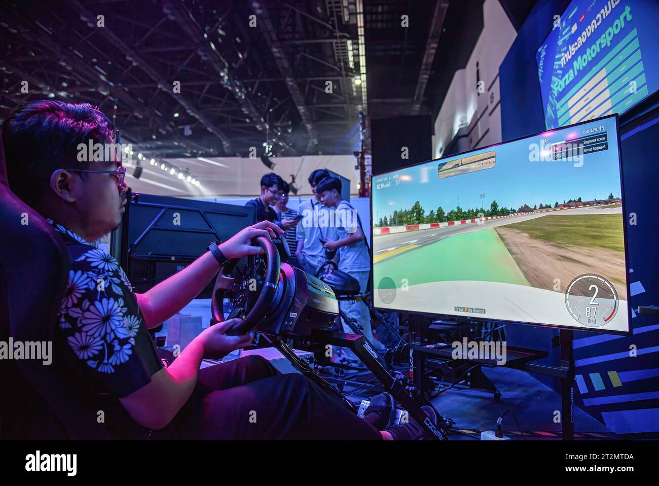 Bangkok, Thailand. 20th Oct, 2023. A visitor seen playing a "Forza ...