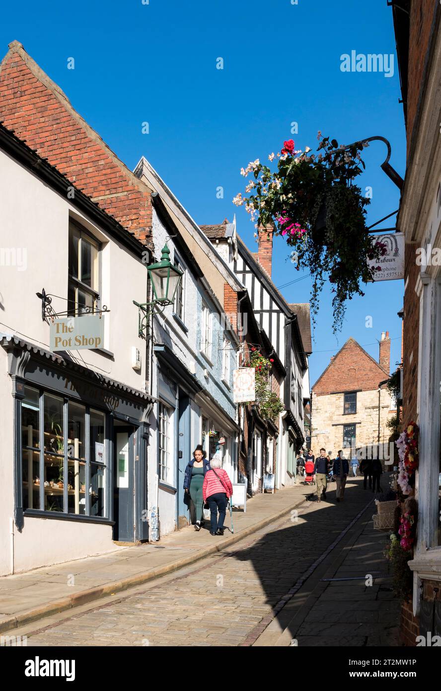 West side of Steep Hill in bright autumn sun, Lincoln City ...