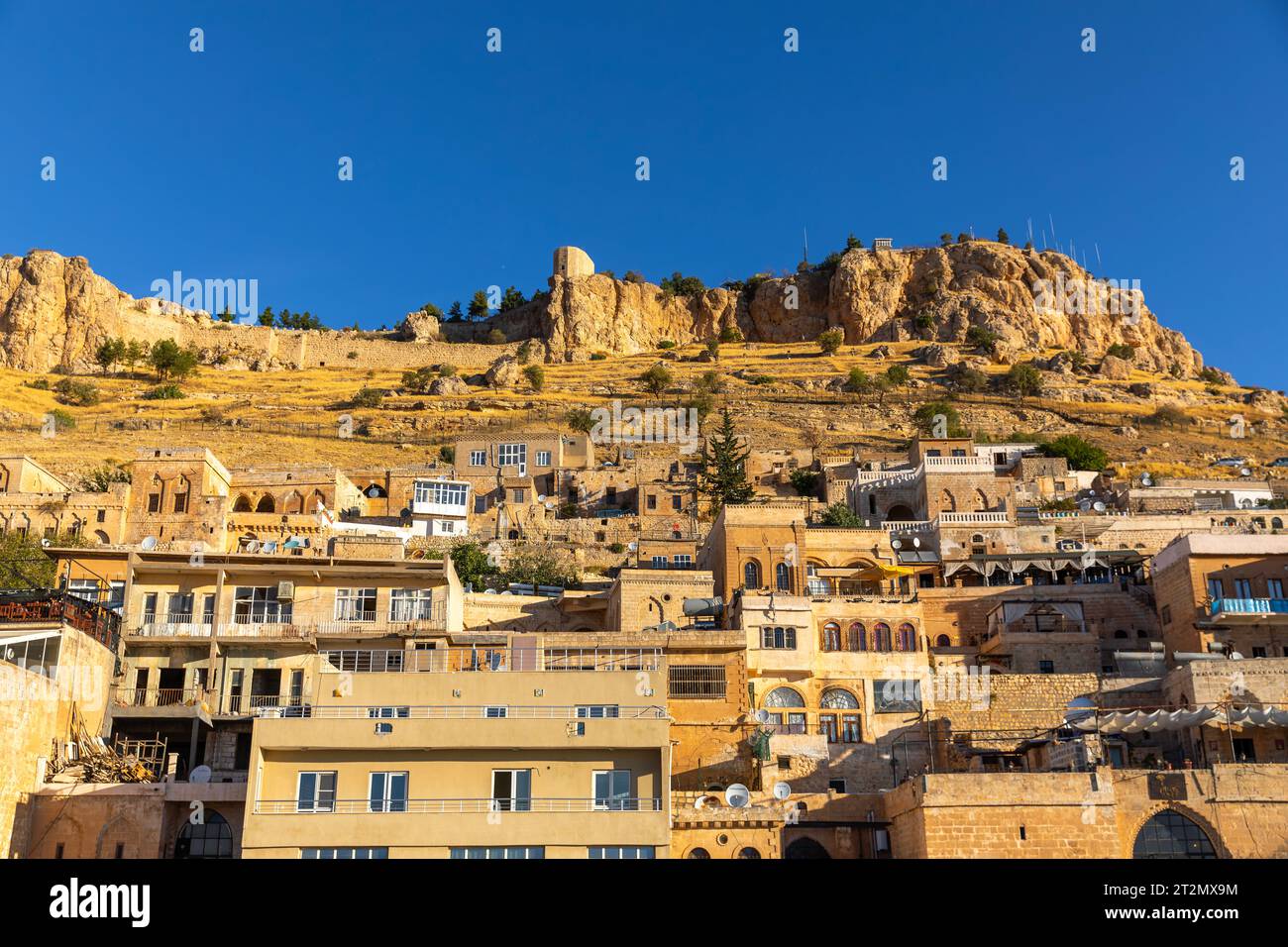 Ancient and stone houses of Old Mardin (Eski Mardin) with Mardin Castle ...