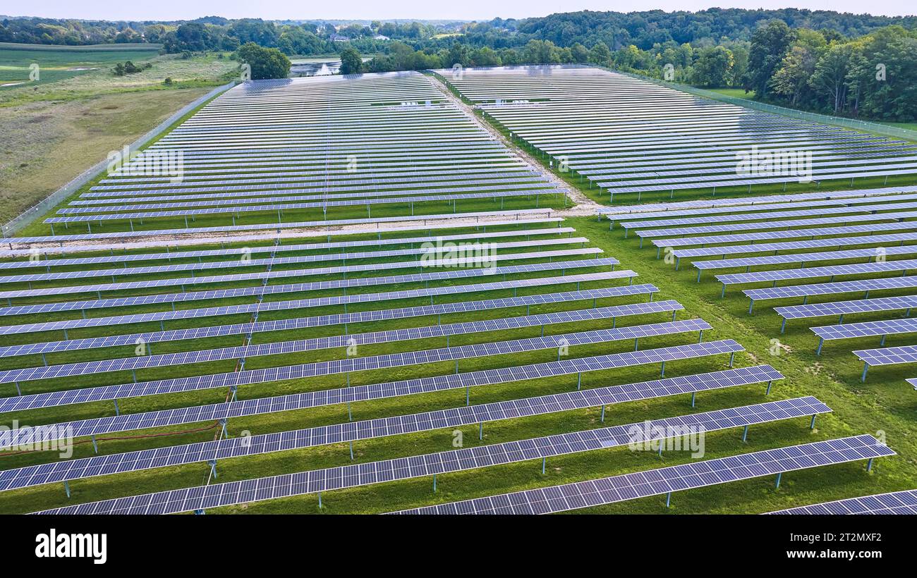 Low aerial view of horizontal solar panel rows Stock Photo - Alamy