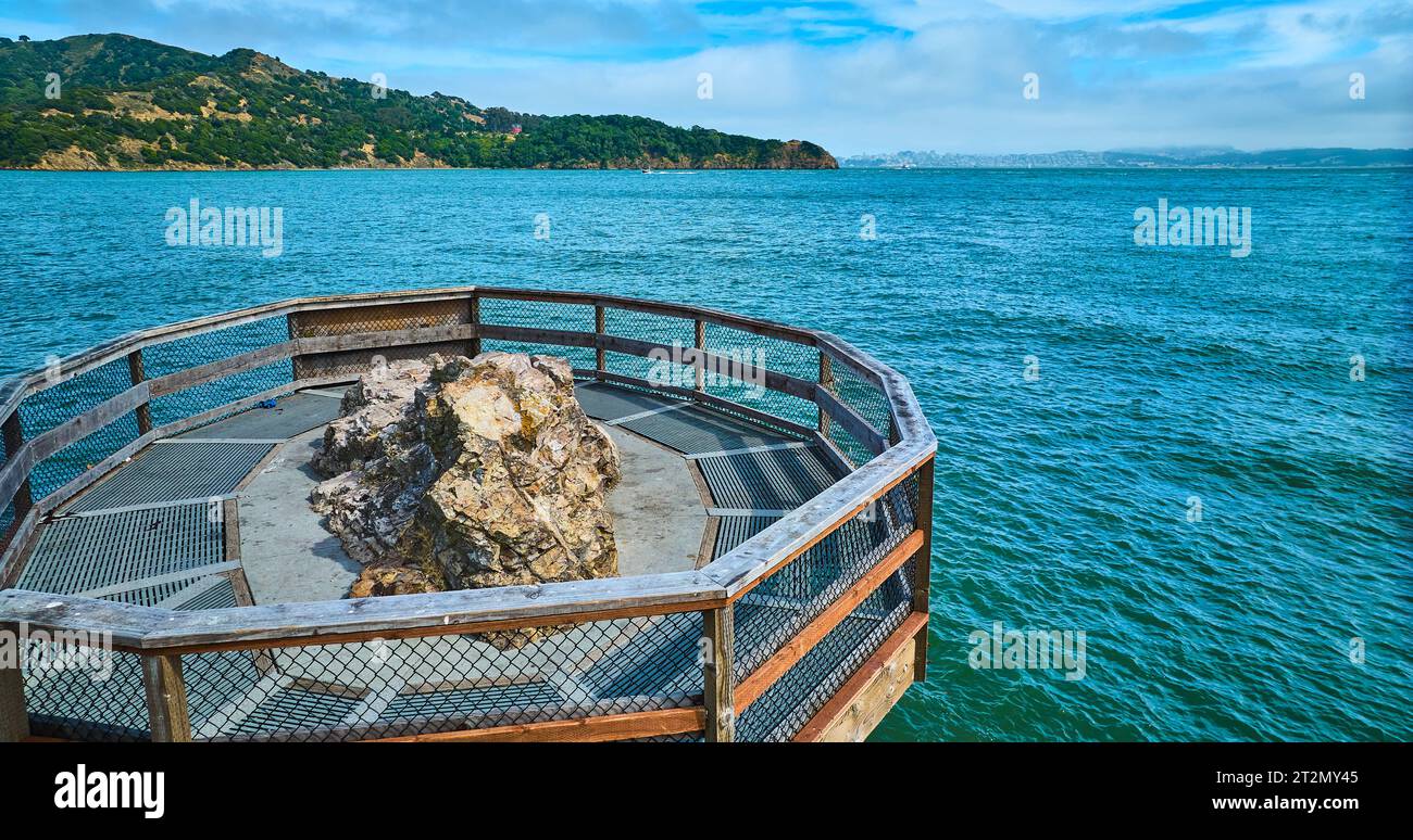 Elephant Rock aerial close up with coast across bay and blue sky with ...
