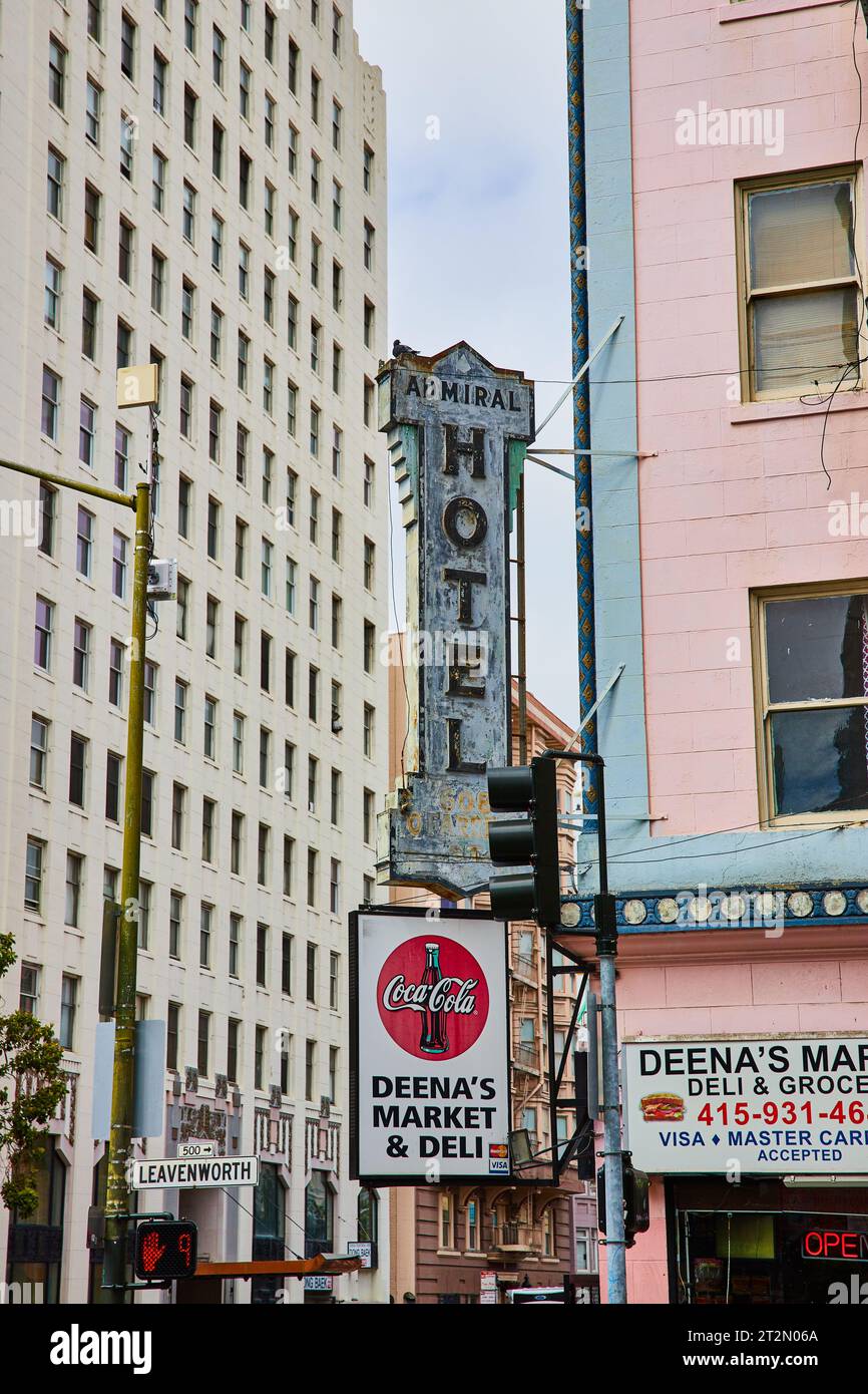Admiral Hotel sign with pink building and restaurant sign below Stock ...