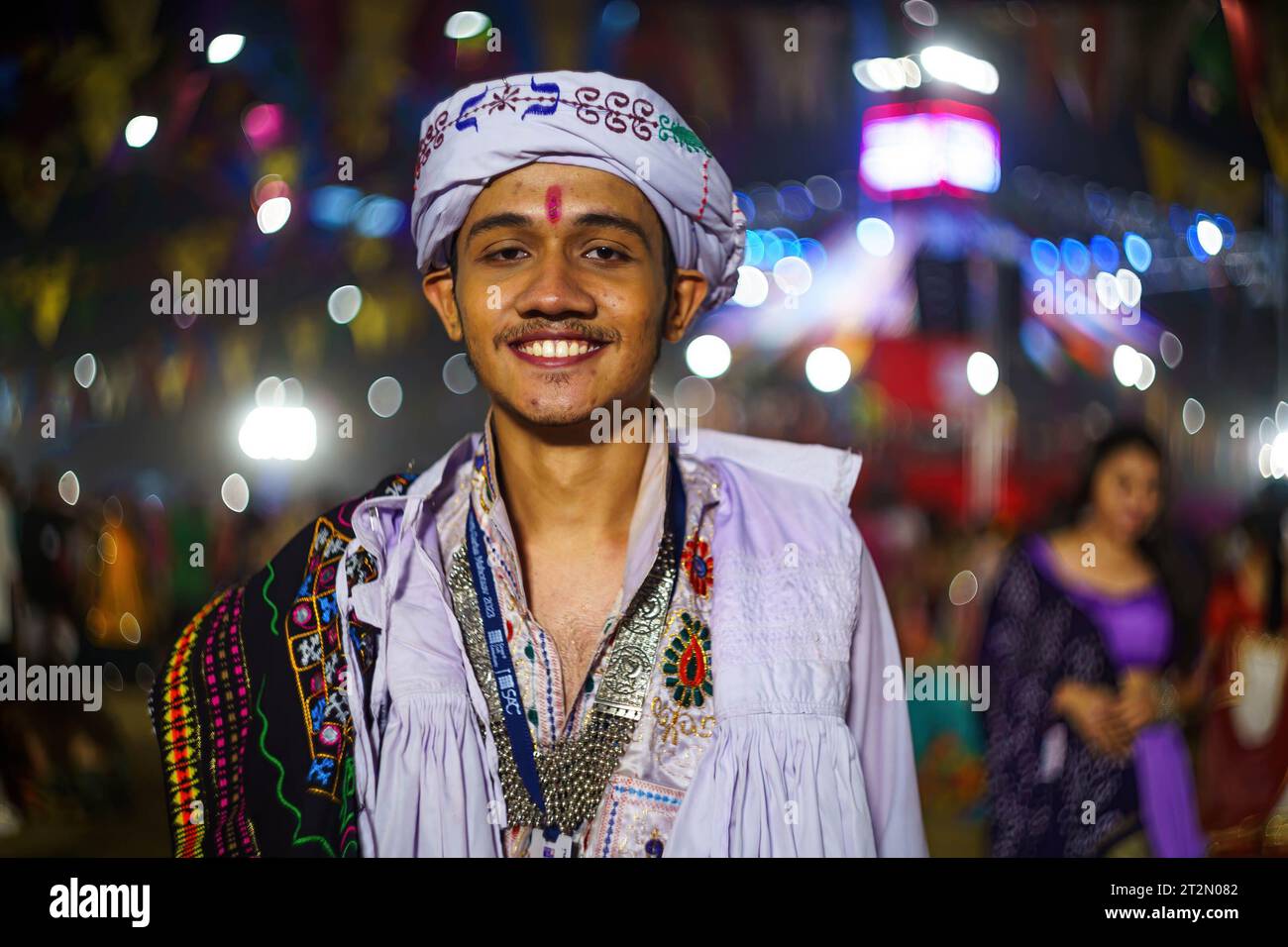 A man in traditional Indian clothes seen during the traditional Garba ...