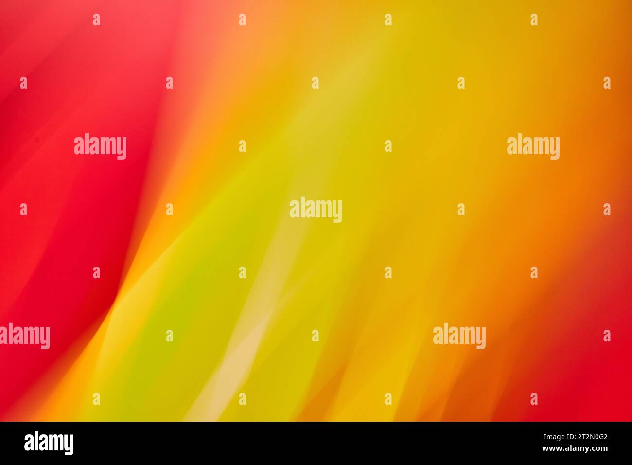 Abstract yellow flame ending in orange and framed by red on two corners ...