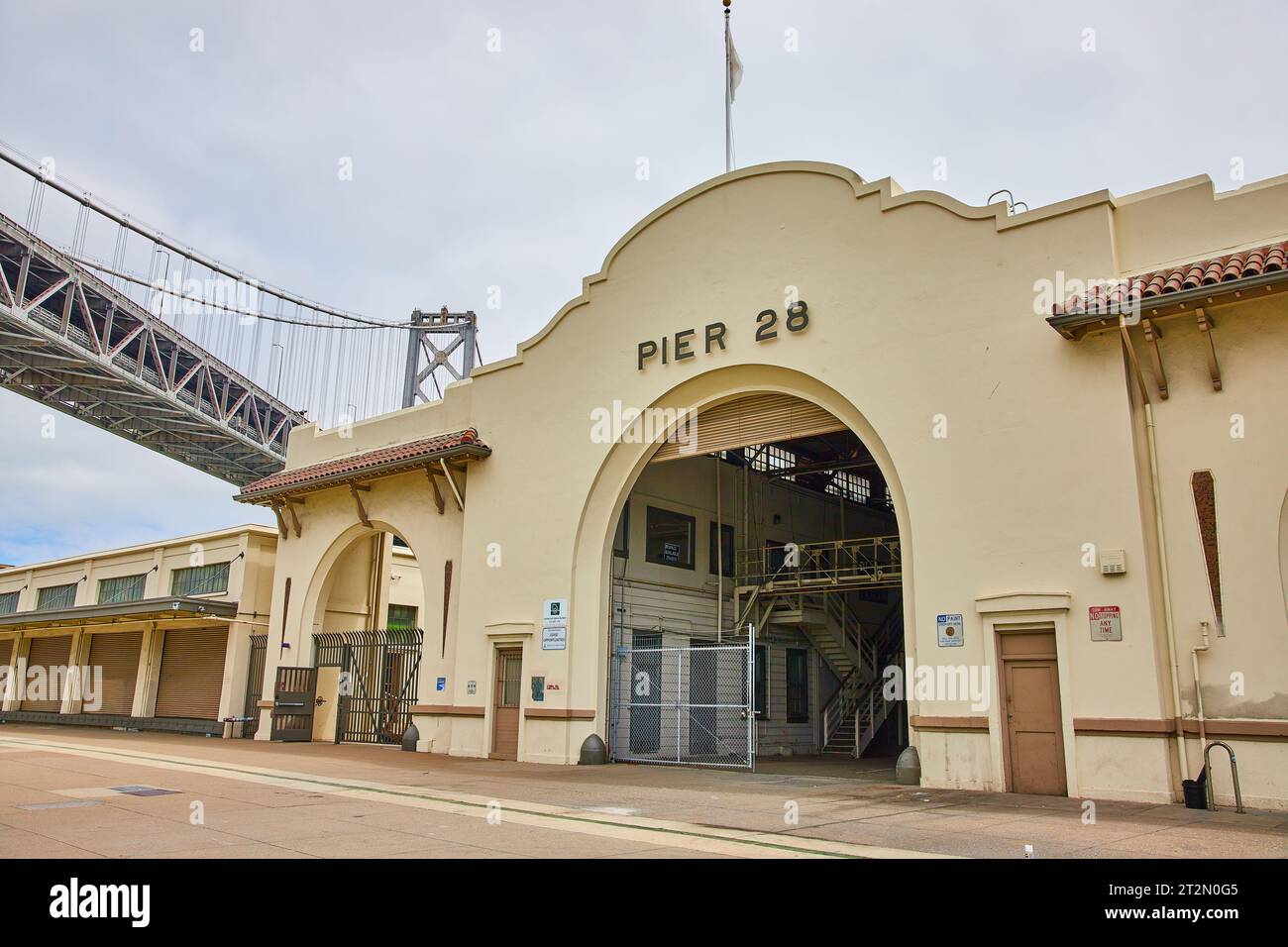 Pier 28 arch entrance to building with staircase inside and Oakland Bay ...