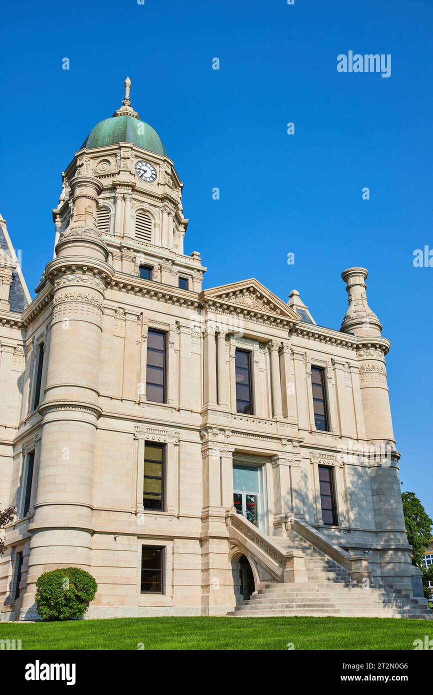 Green lawn and blue sky day with partial view of Whitley County ...