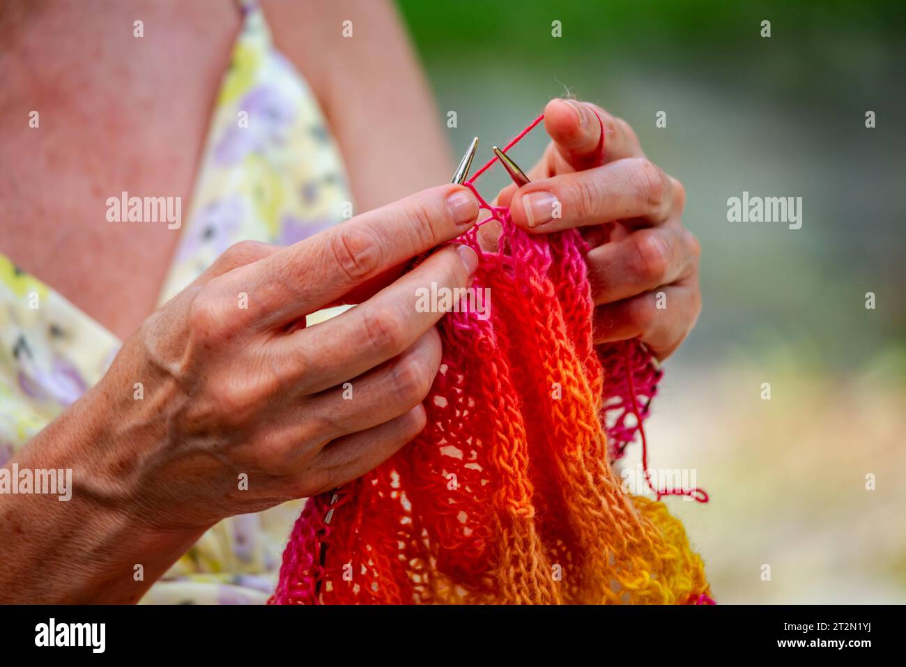 Senior woman knits warm scarf hi-res stock photography and images - Alamy