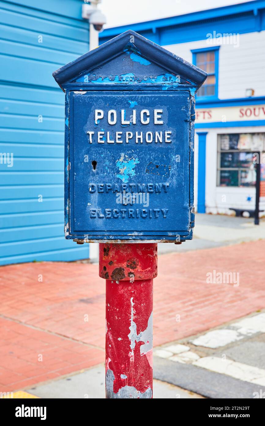 Vintage Police Telephone stand on red pole with blue box in front of ...