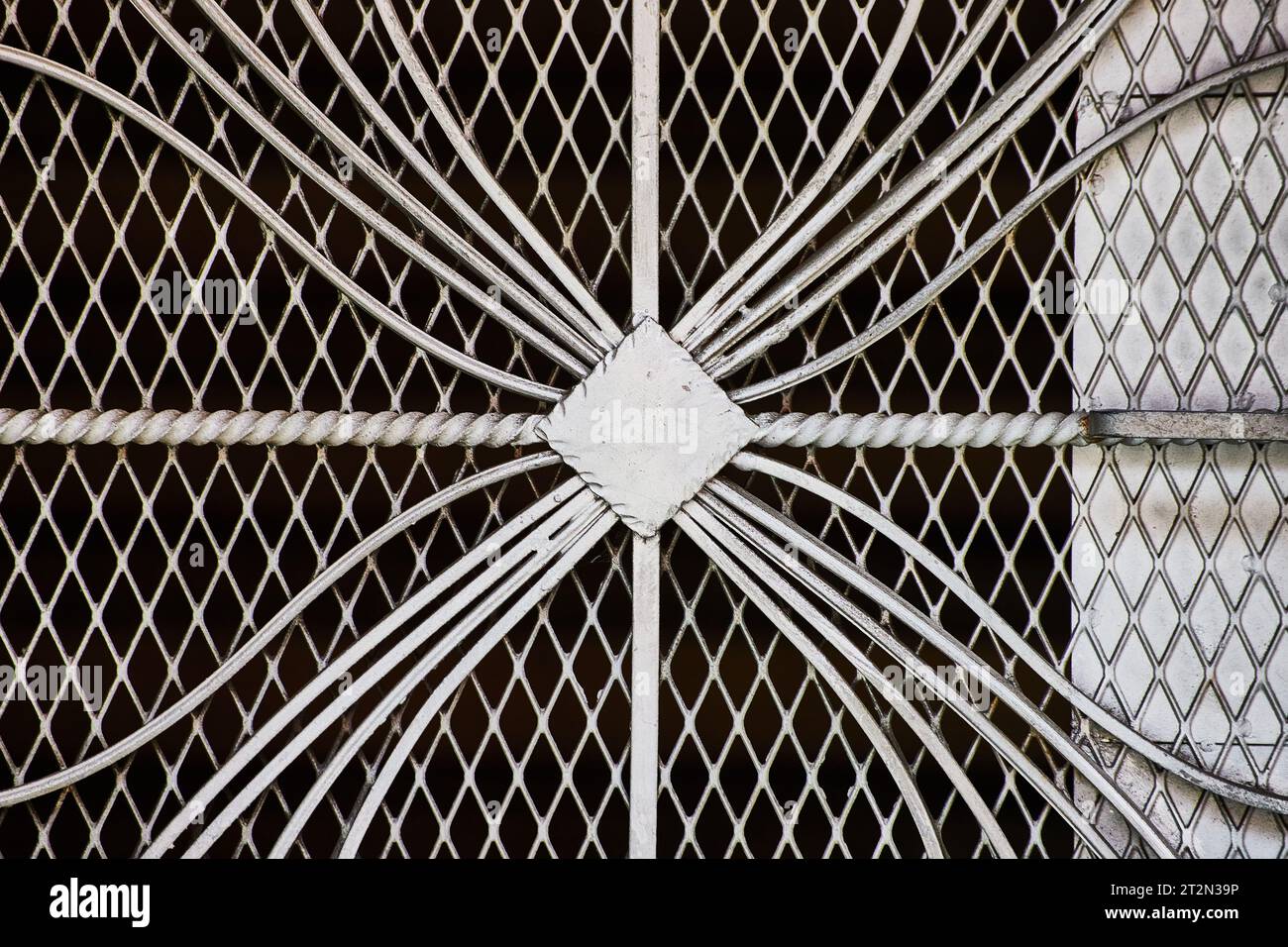 Silver chain link metal fence with diamond in middle and black ...