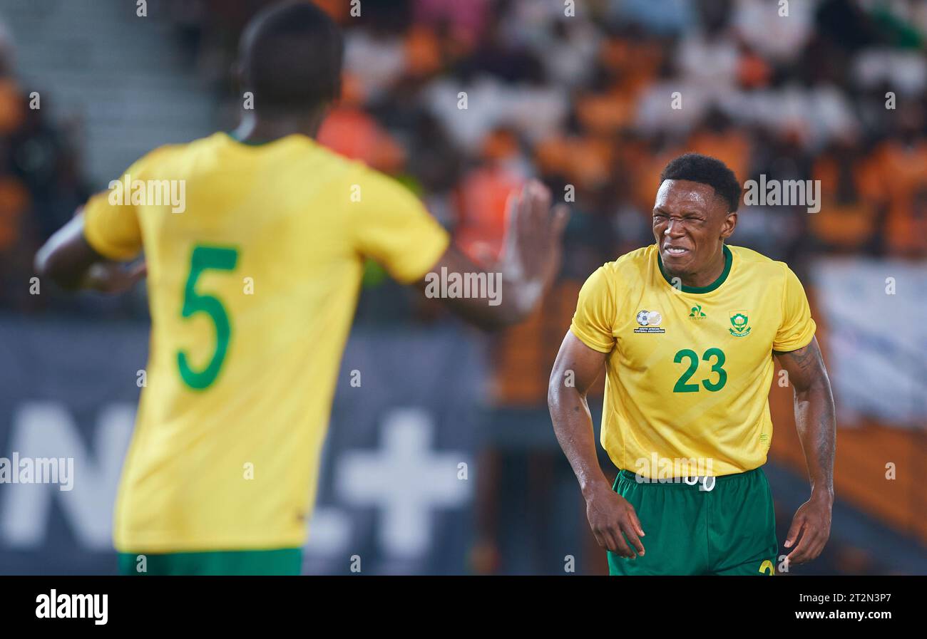 Lebo Mothiba grimacing after contact with an Ivorian player Stock Photo ...