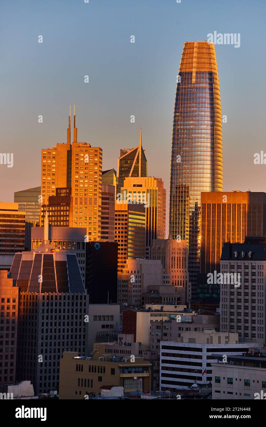 Golden light on tops of downtown San Francisco skyscrapers with sunset ...