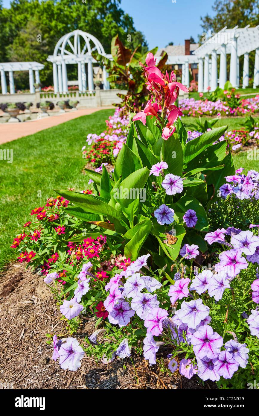 Gorgeous flowers at Lakeside Park with white trellises and pergola in ...