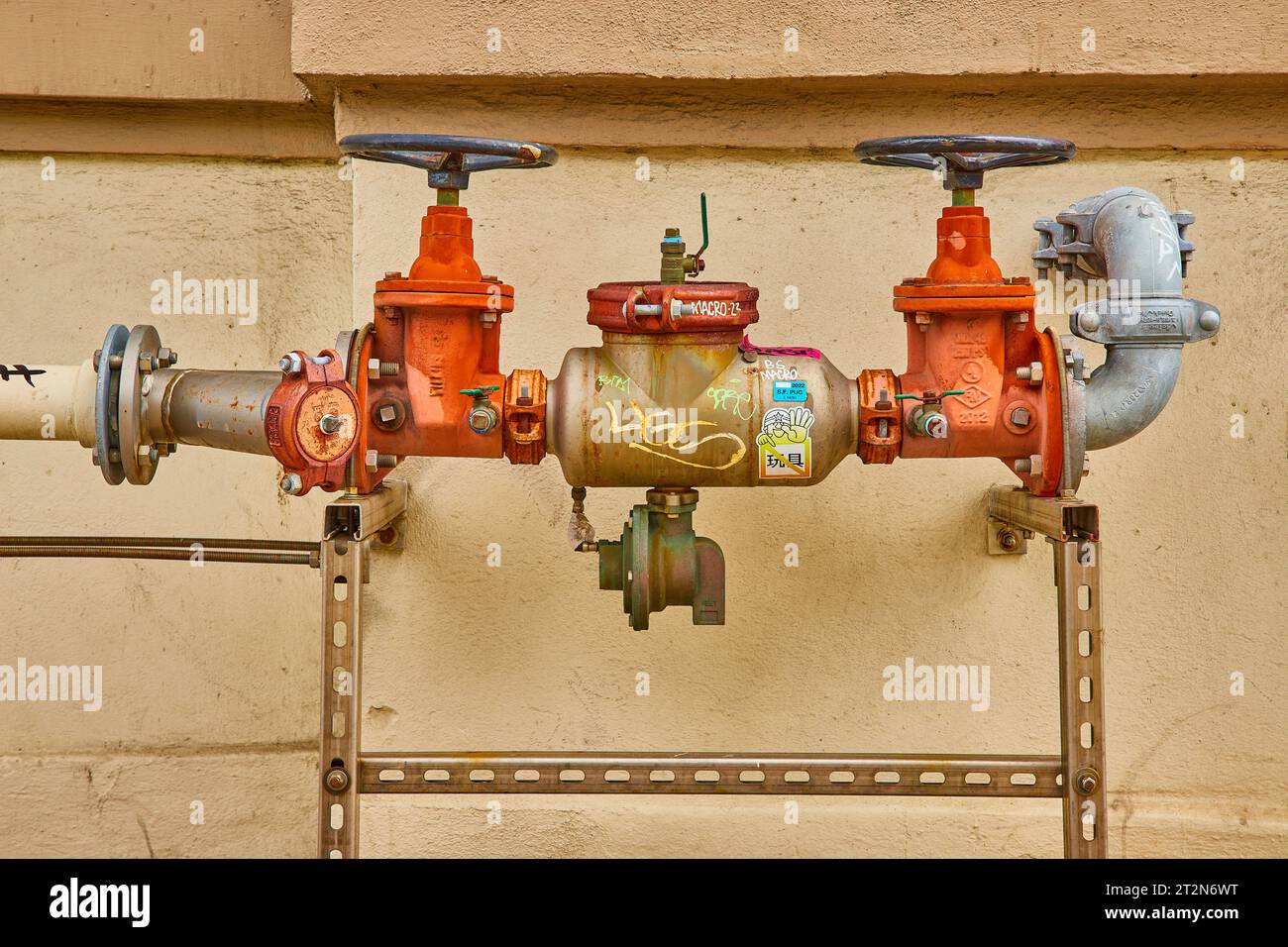 Colorful piping with wheels to spin for release with gold middle and ...