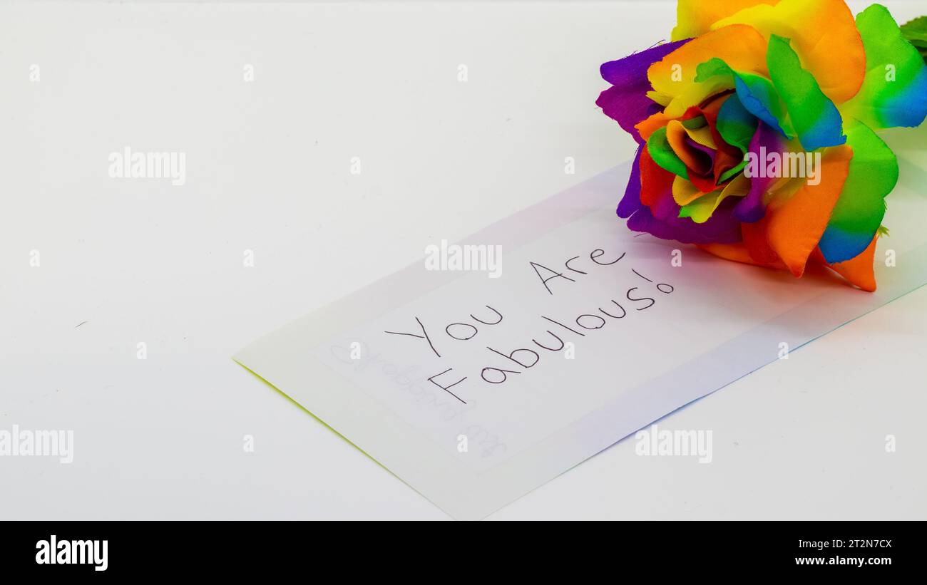 You are fabulous handwritten note with rose Stock Photo - Alamy