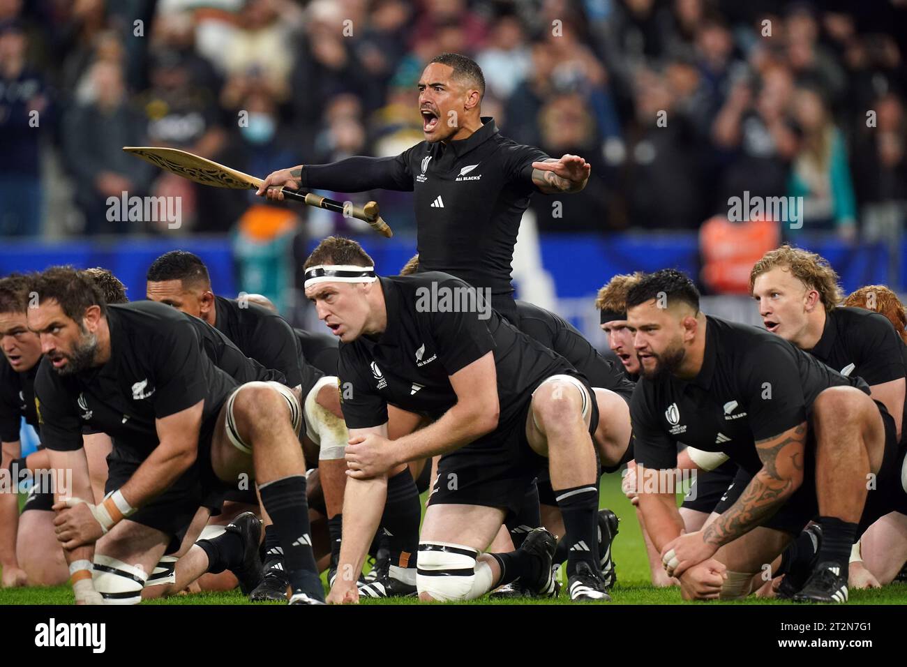 New Zealand's Aaron Smith leads his team-mates as they perform the Haka ...