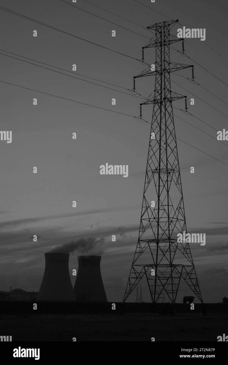cooling towers and pylon at port of antwerp Stock Photo - Alamy