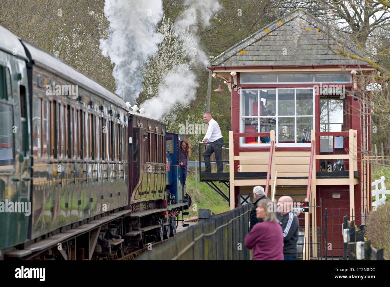 A train passes Wittersham Road signalbox on the Kent and East Sussex ...