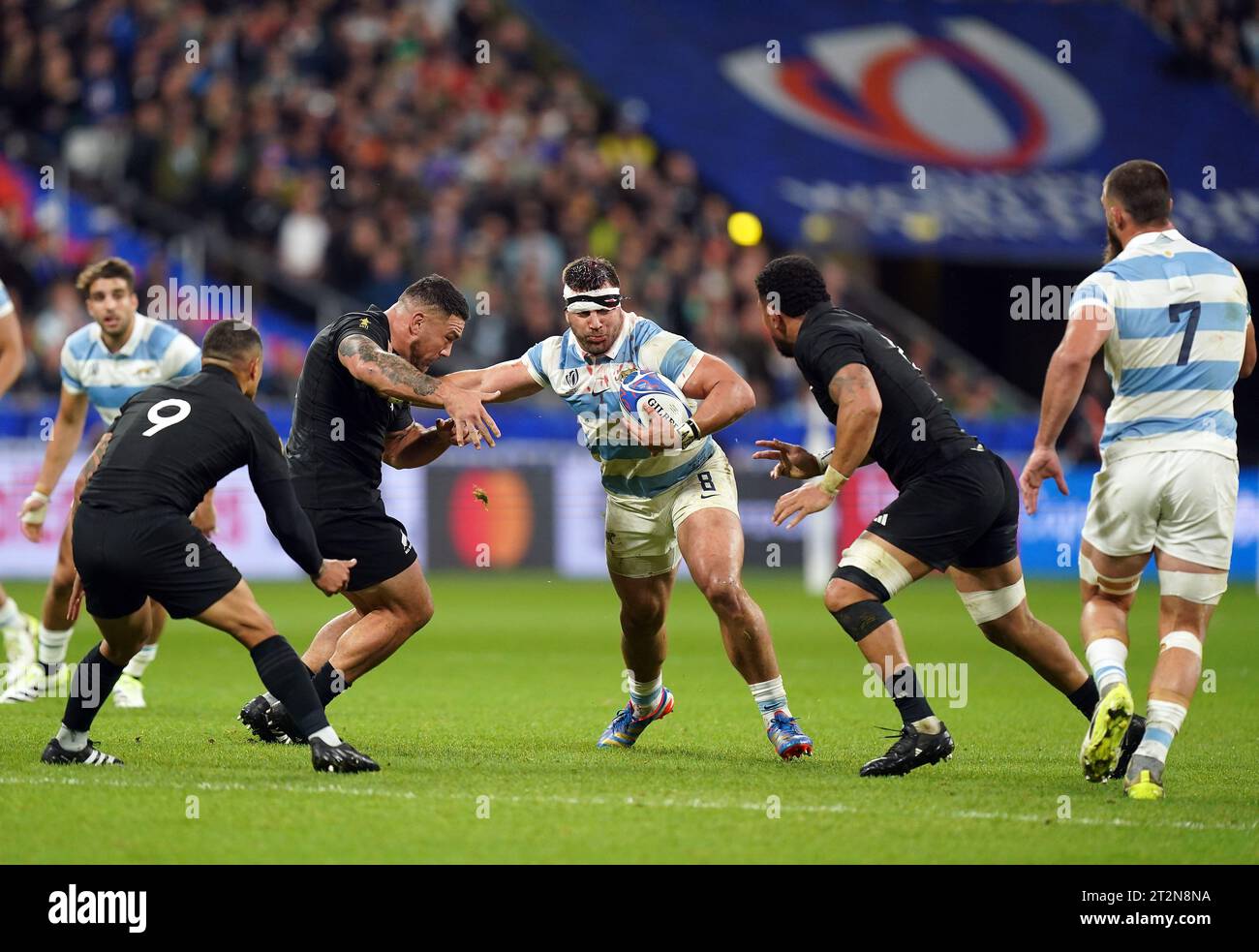 Argentina's Facundo Isa is tackled by New Zealand's Codie Taylor during ...