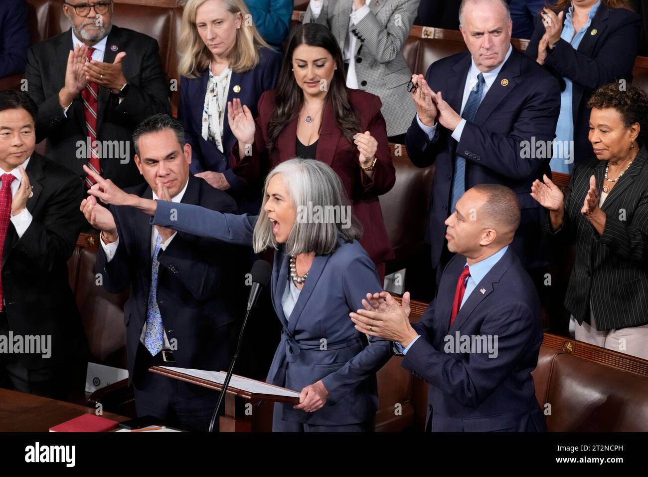Rep. Katherine Clark, D-Mass., the Democratic whip, center, flanked by ...