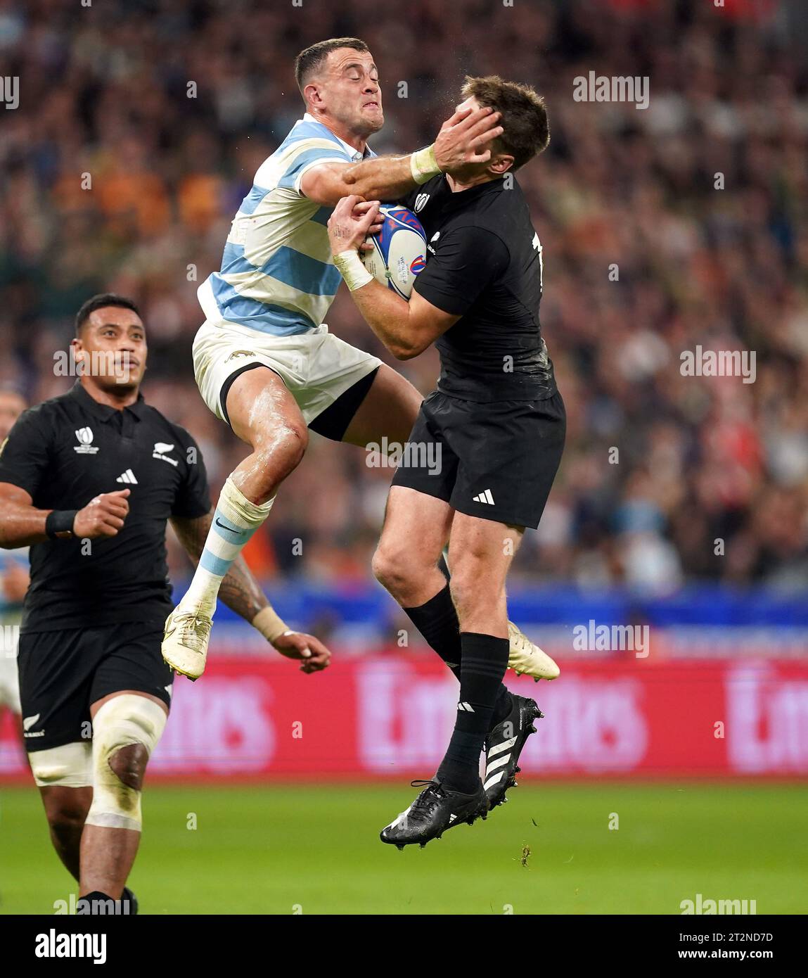 New Zealand's Beauden Barrett and Argentina's Emiliano Bo?elli compete ...