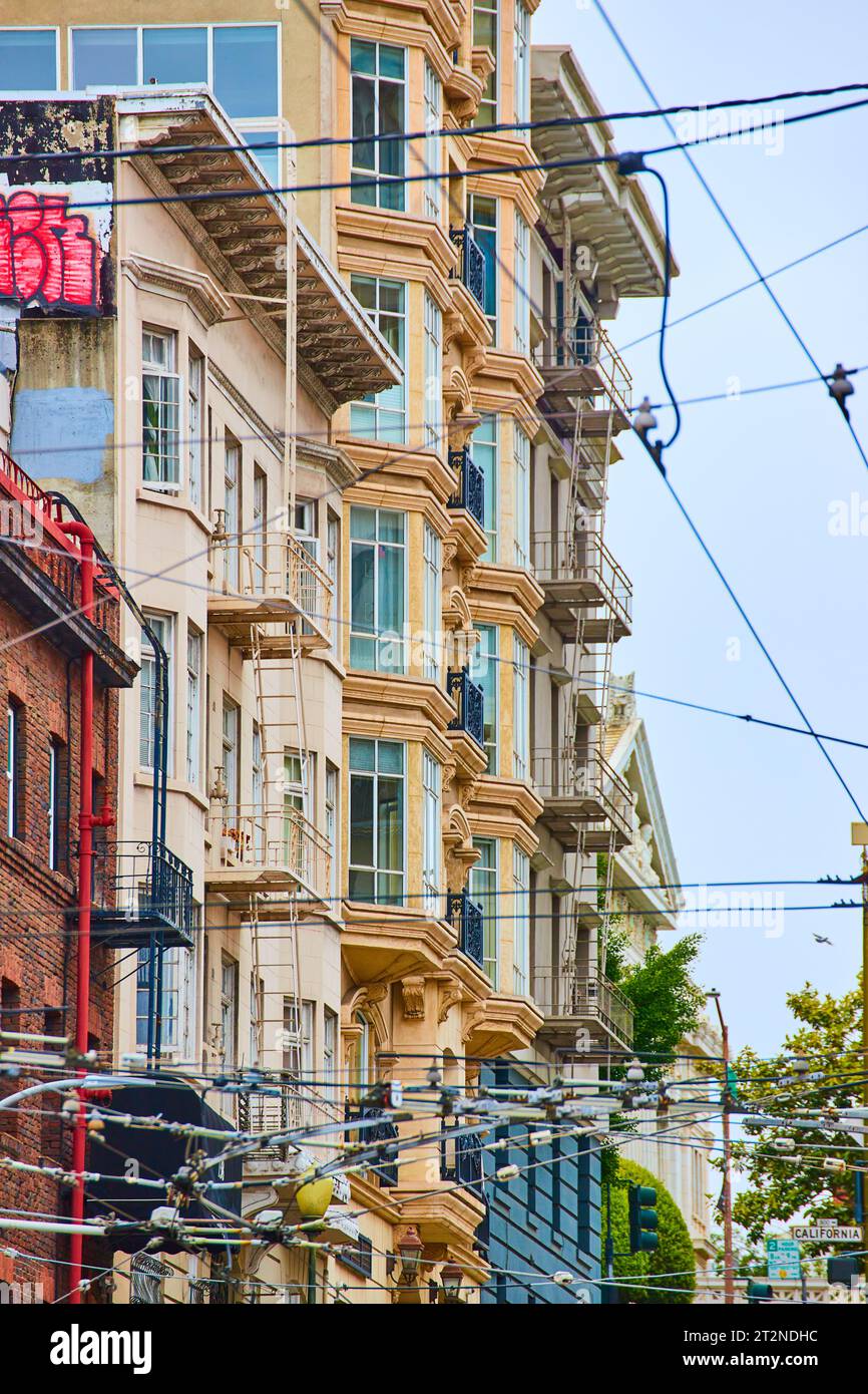 Side view of housing with jutting out windows in a long row of ...
