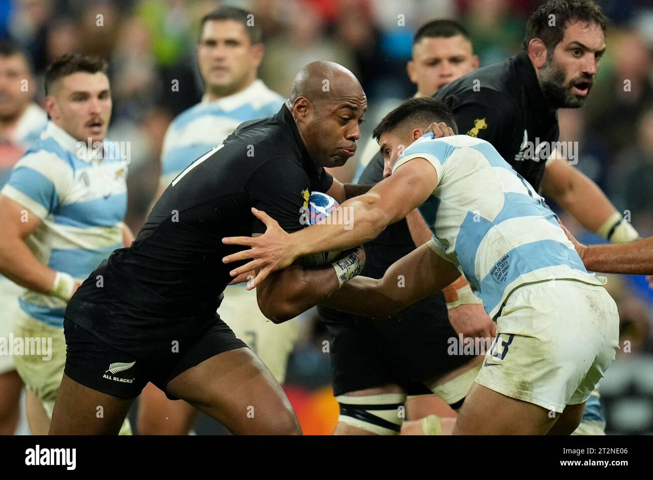 New Zealand's Mark Telea ,left, is grappled by Argentina's Lucio Cinti ...
