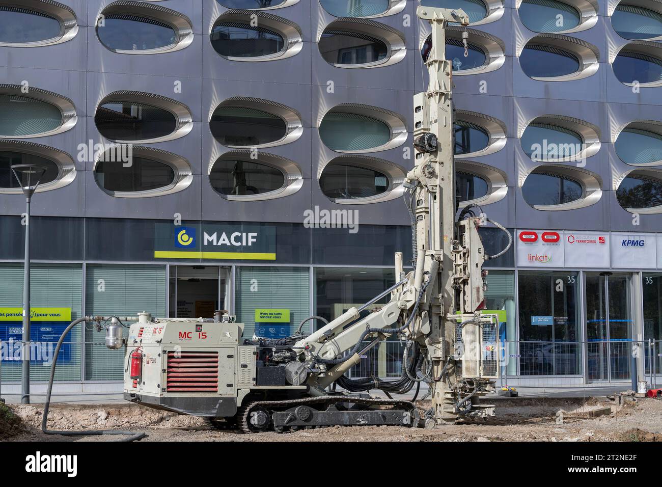 Grey compact drilling rig Comacchio MC 15 on construction site Stock ...