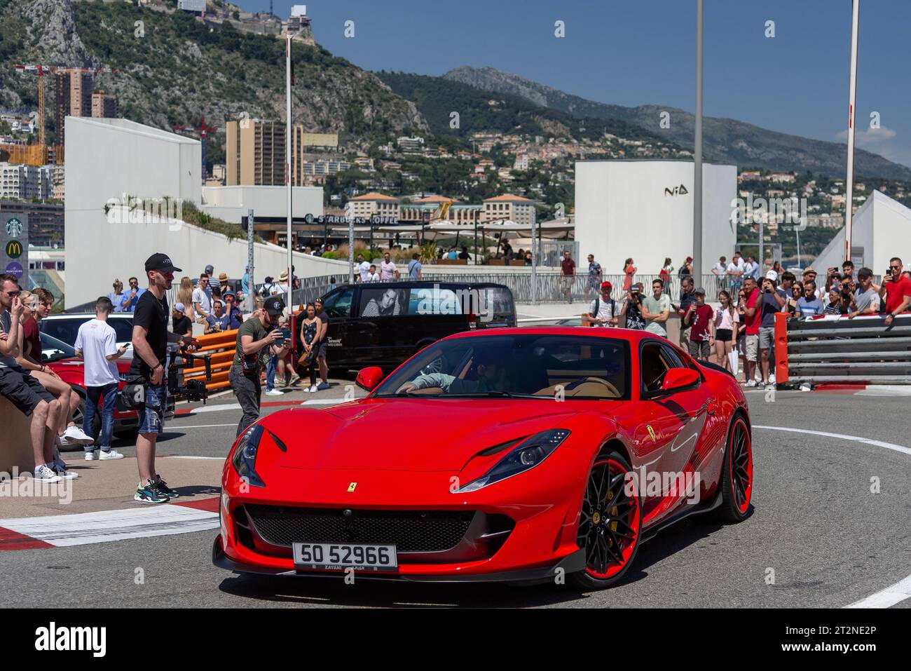 Ferrari 812 Superfast Novitec Rosso driving on the road Stock Photo - Alamy