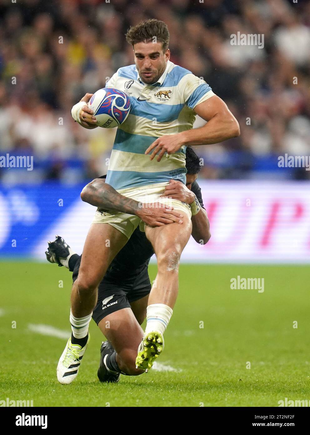 Argentina's Juan Mallia is tackled by New Zealand's Rieko Ioane during ...
