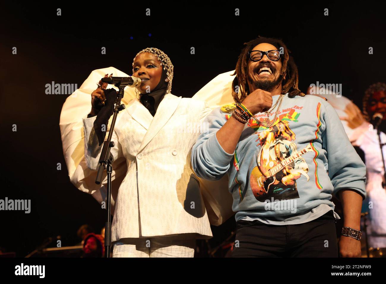 BROOKLYN, NY - OCTOBER 19: Lauryn Hill and Rohan Marley on stage as ...
