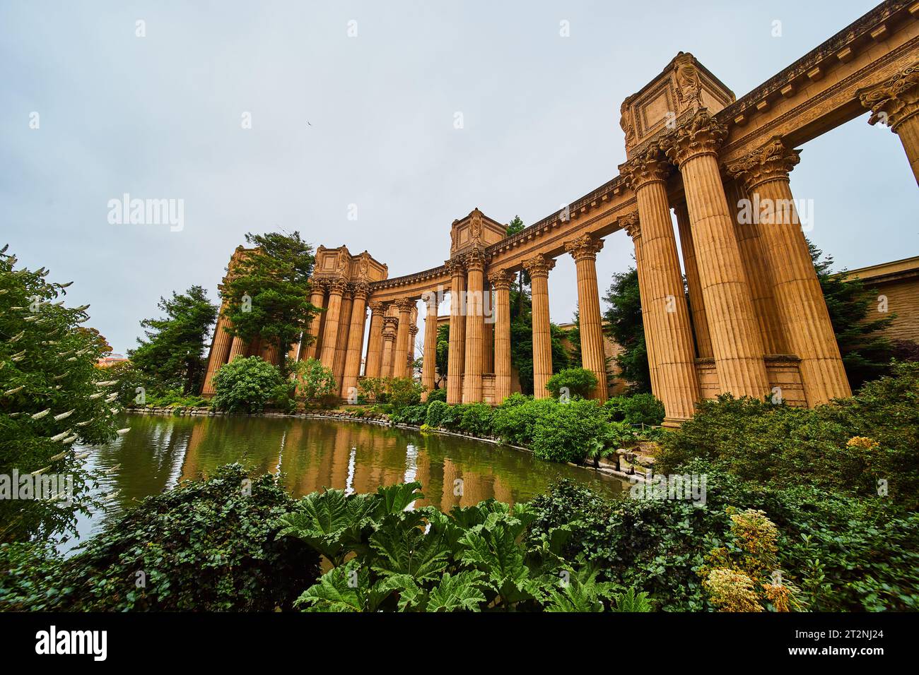 Ancient Roman colonnade around pond creating ruin vibe at Palace of ...