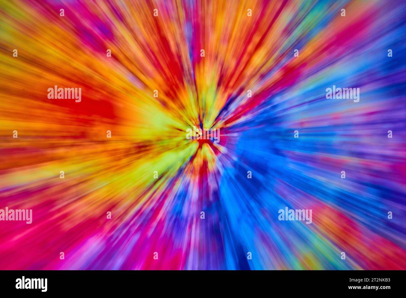 Extreme tie dye with bursts of neon bright rainbow colors in background ...