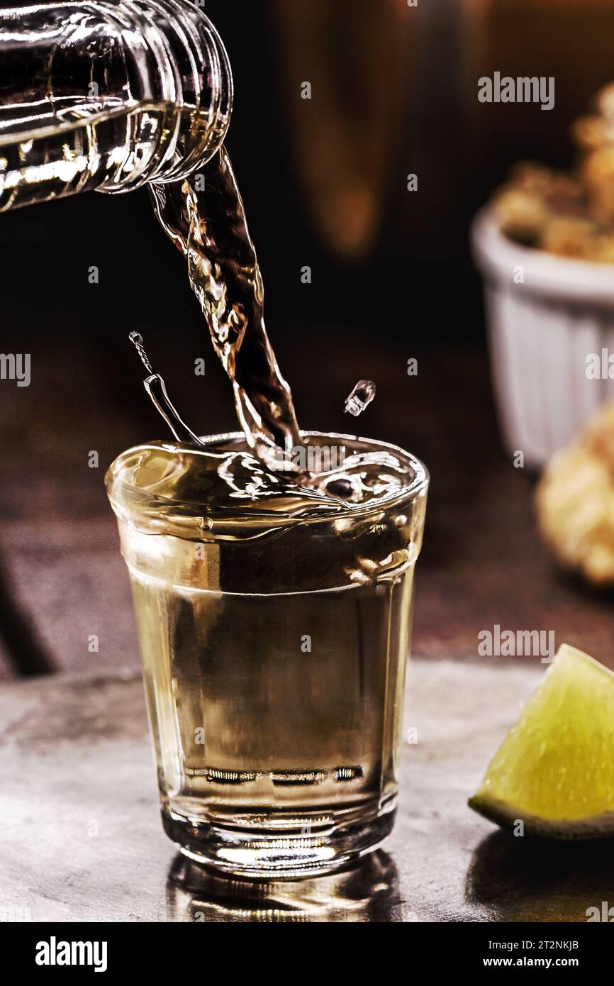 glass of Cachaça, pinga, cana or caninha is the sugar cane brandy ...