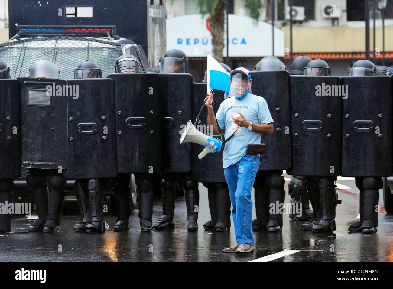 A demonstrator stands by police blocking access to the National ...