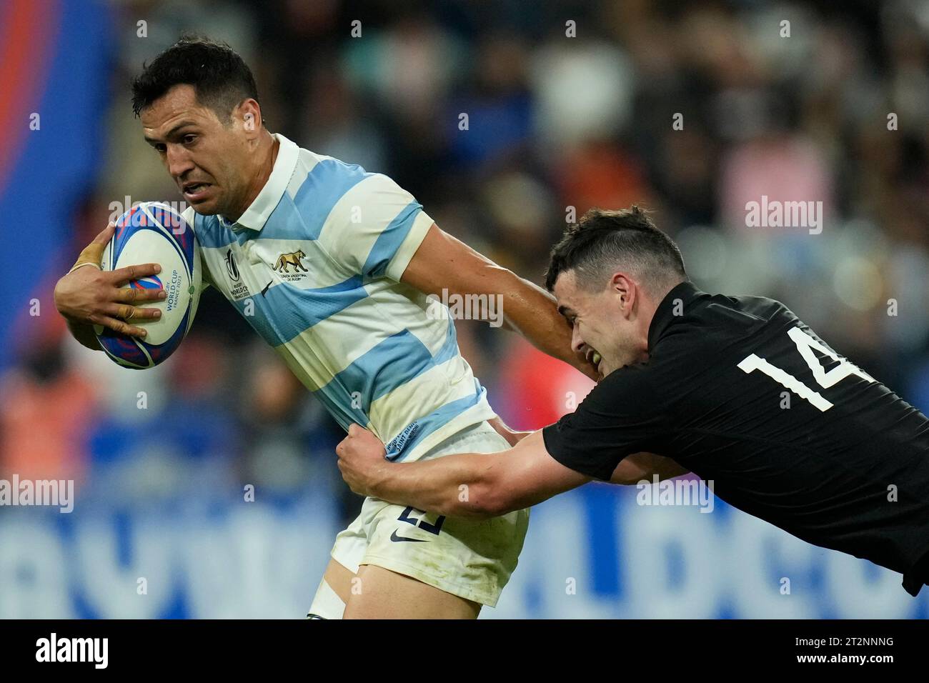 Argentina's Matias Moroni, left is brought down by New Zealand's Will ...